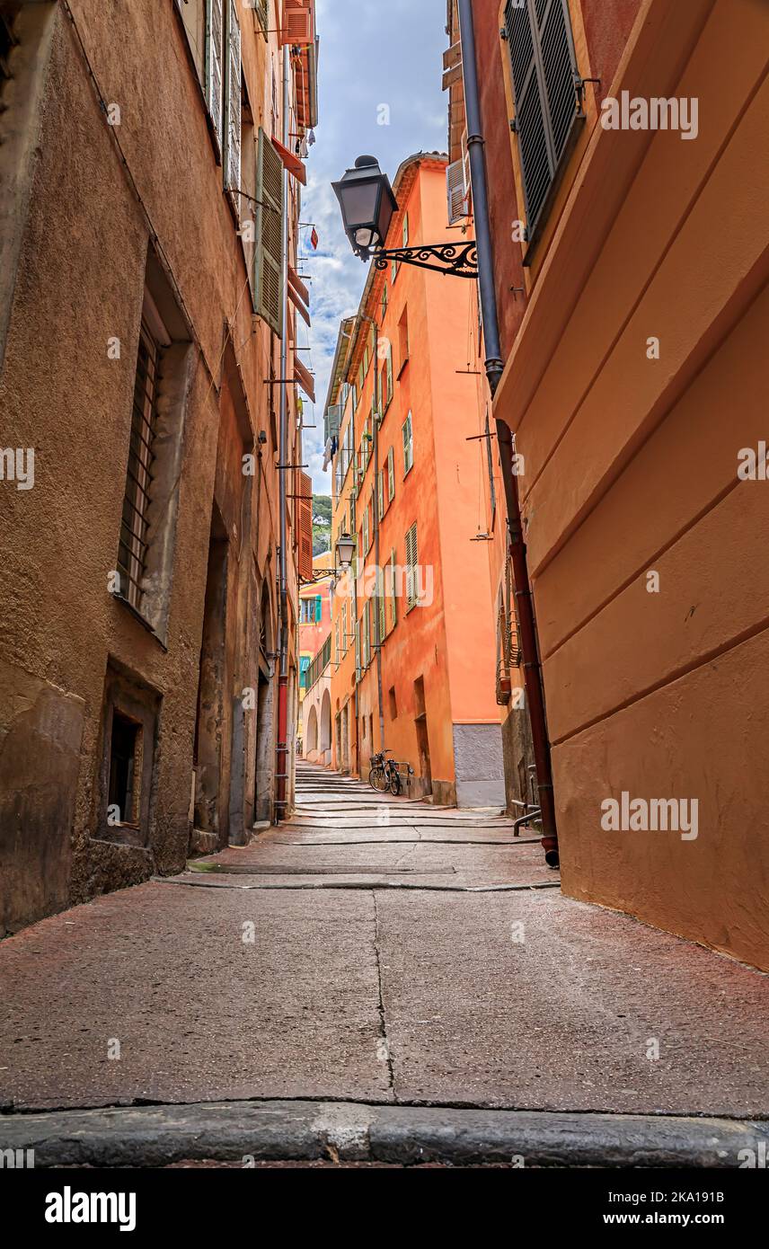 Traditional old houses on a narrow crooked street in the Old Town ...