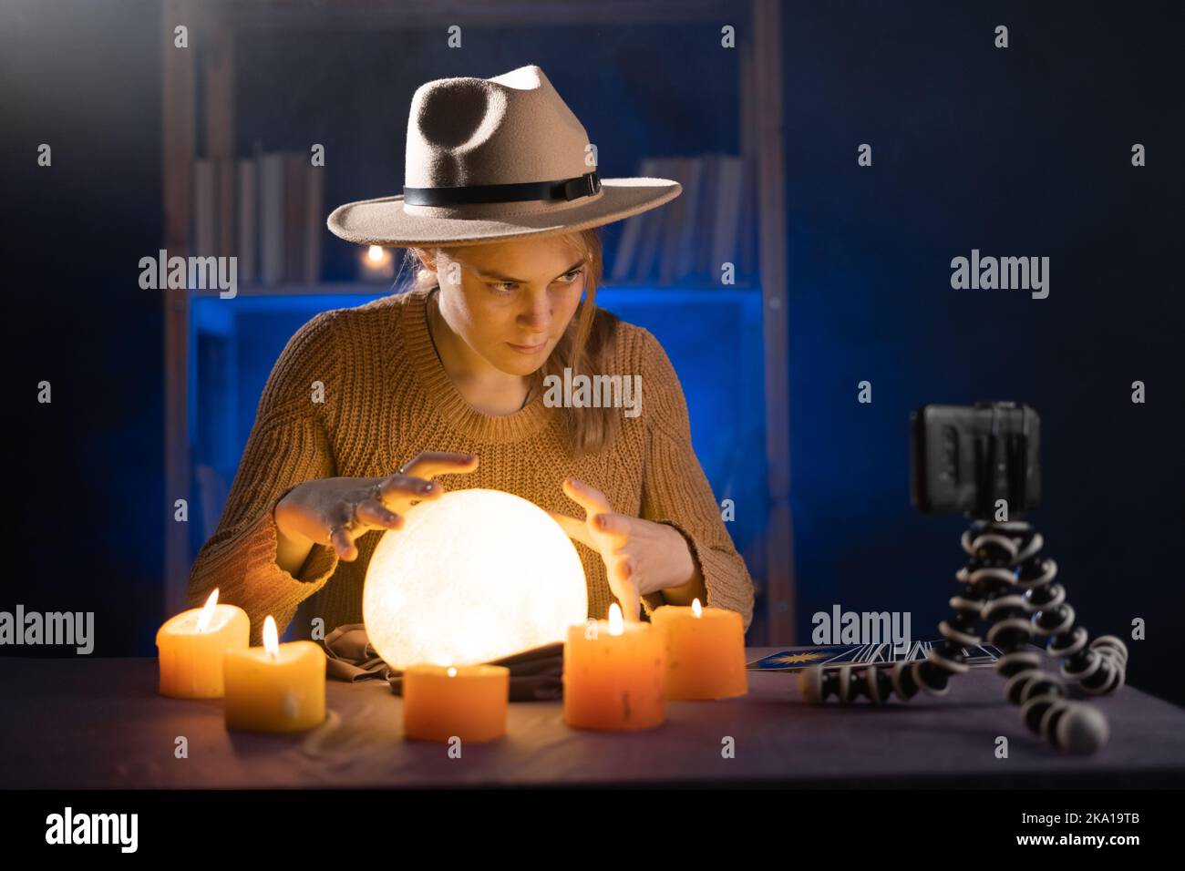 Fortune teller or soothsayer online on smartphone. Using crystal ball ...