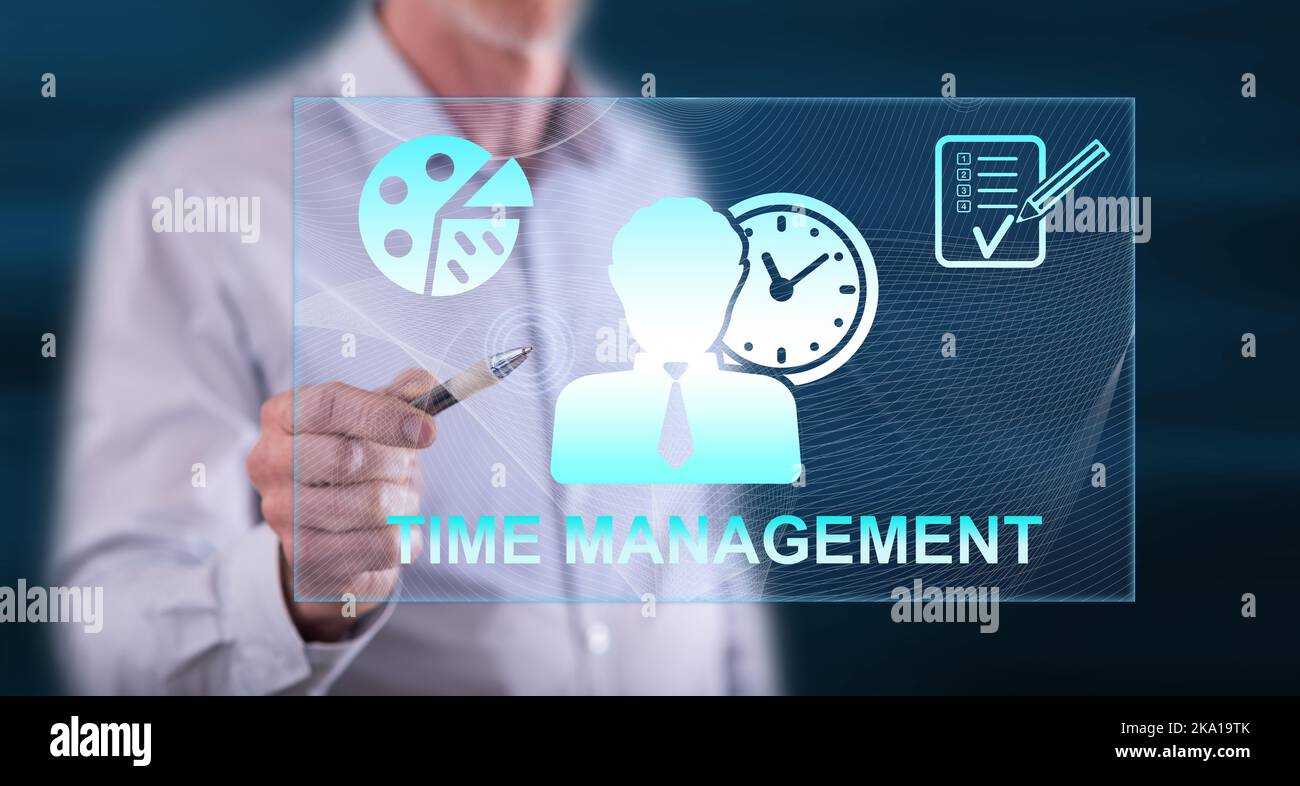 Man touching a time management concept on a touch screen with a pen ...
