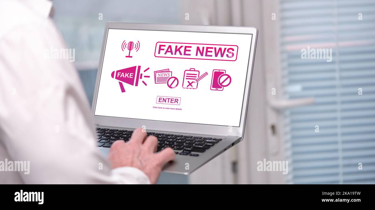 Laptop screen displaying a fake news concept Stock Photo - Alamy