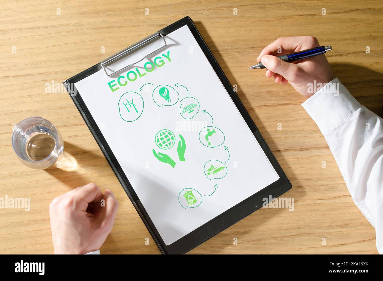 Ecology concept on a clipboard Stock Photo - Alamy