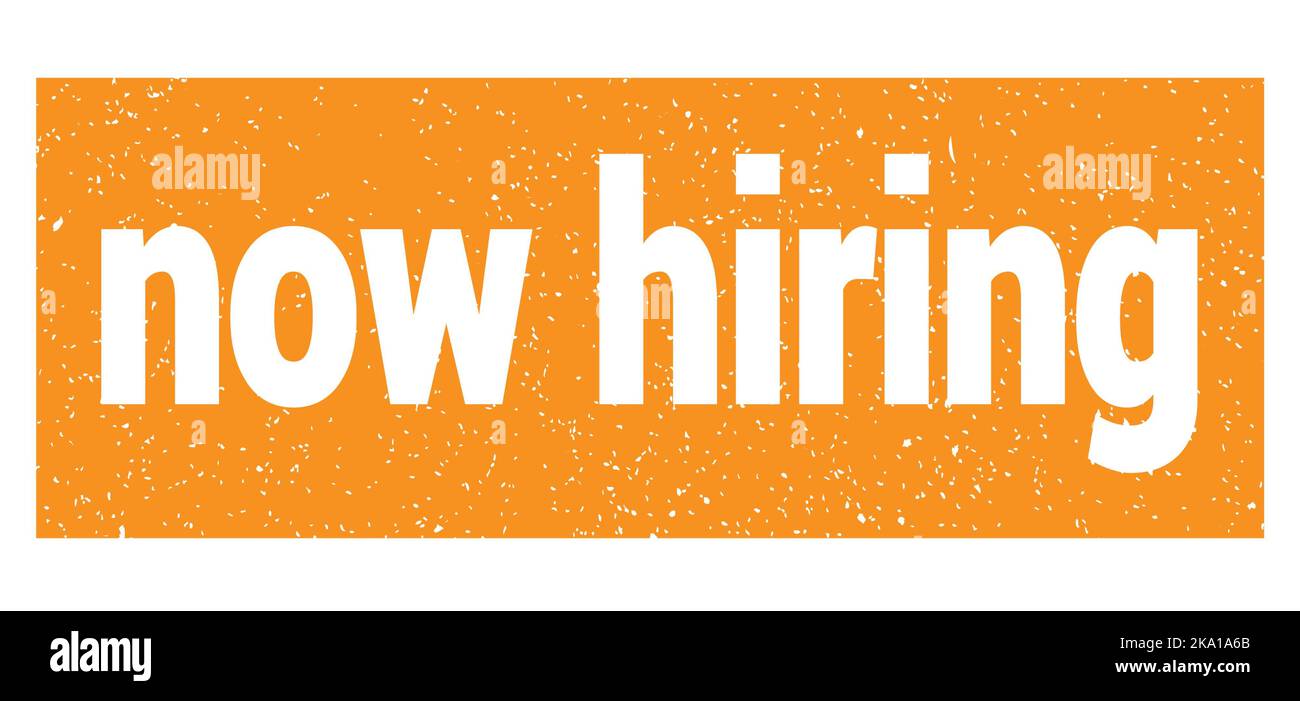 now hiring text written on orange grungy stamp sign Stock Photo - Alamy