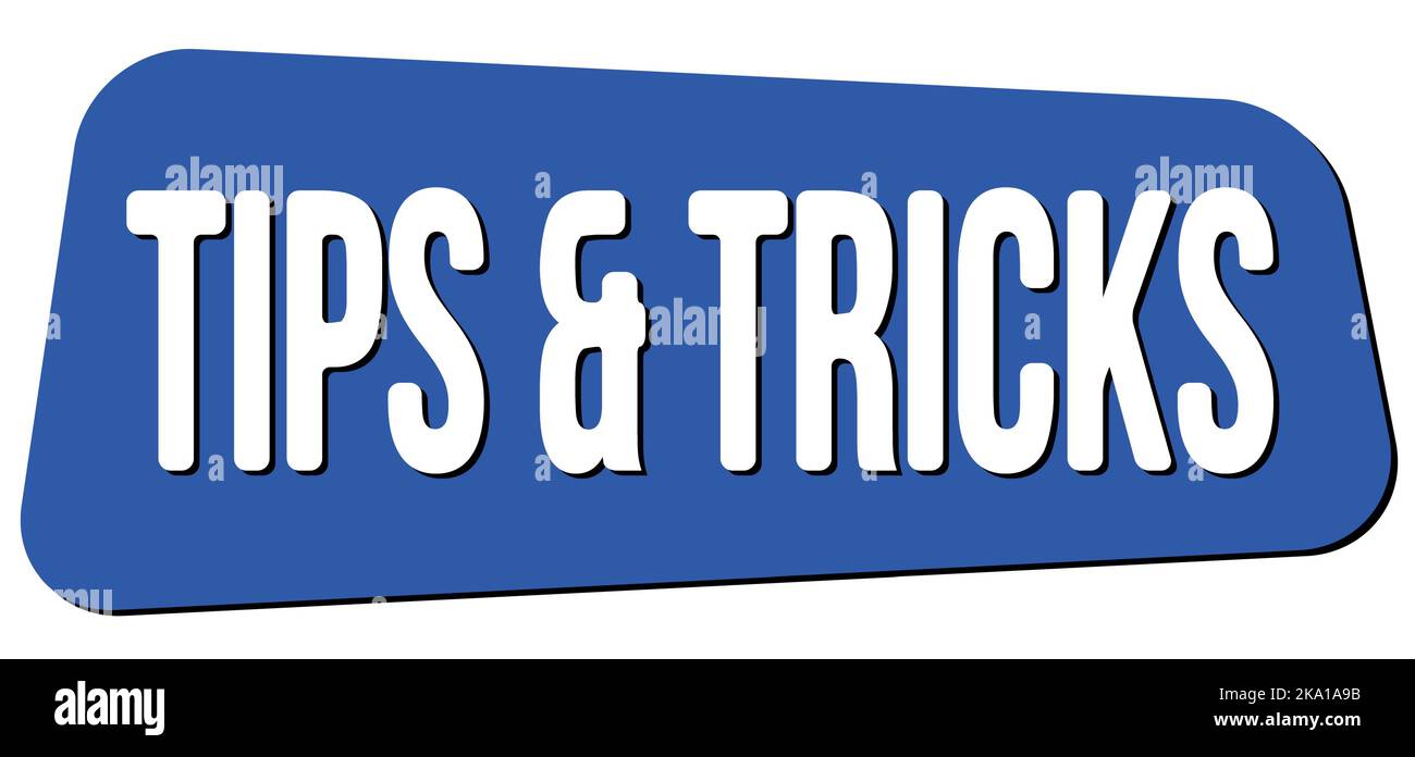 TIPS & TRICKS text written on blue trapeze stamp sign Stock Photo - Alamy
