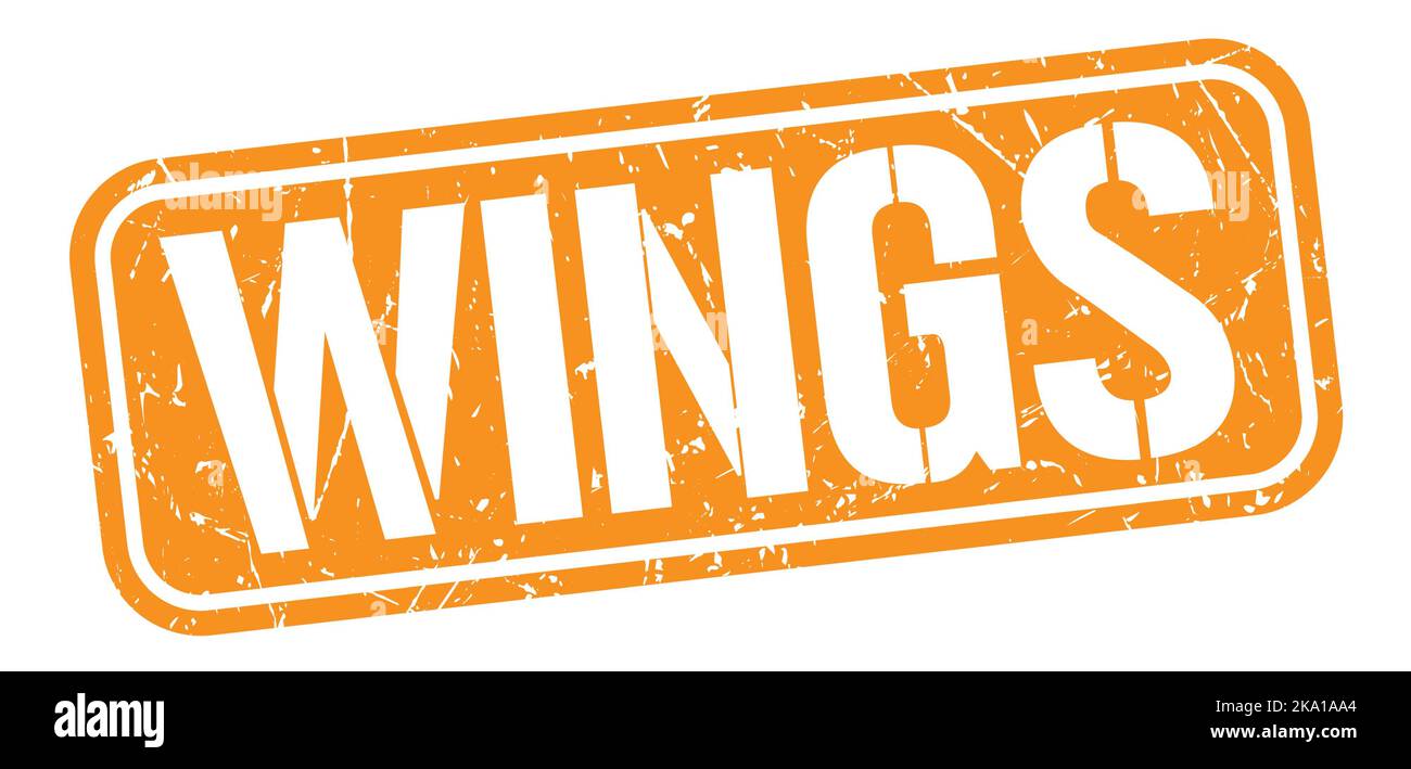 WINGS text written on orange grungy stamp sign Stock Photo - Alamy