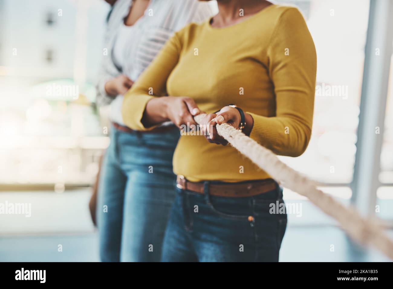 Pulling on a rope hi-res stock photography and images - Alamy