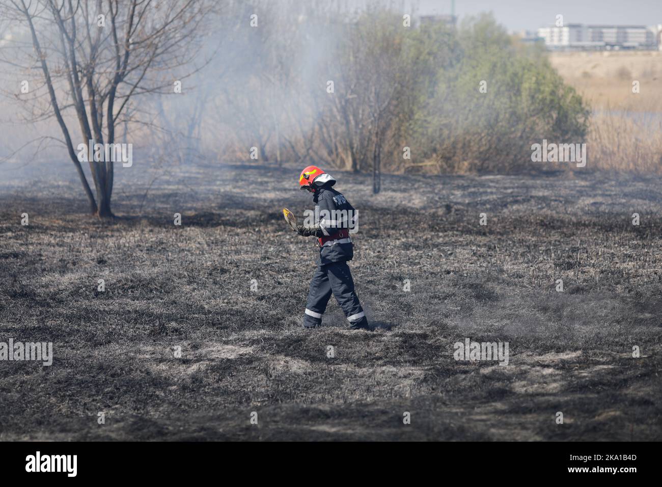 Bucharest, Romania - April 5, 2022: Firefighters try to extinguish a ...