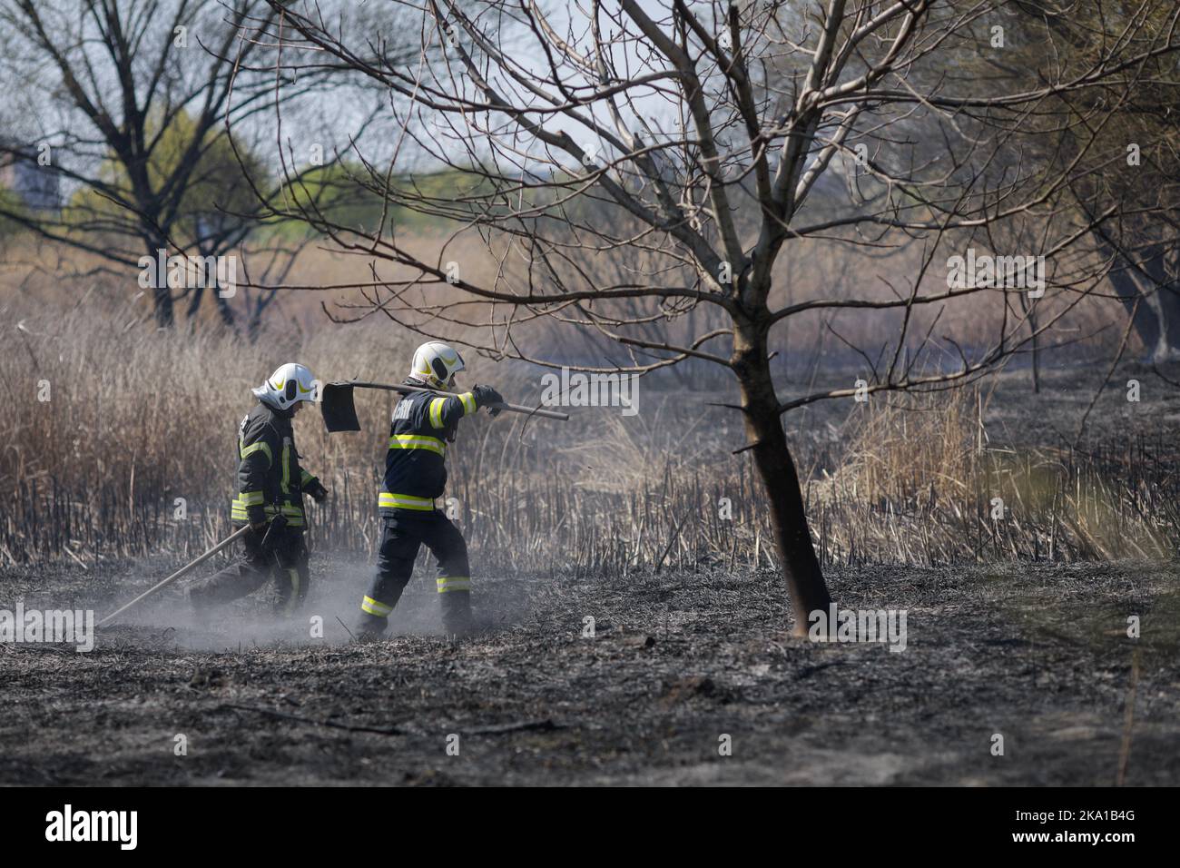 Bucharest, Romania - April 5, 2022: Firefighters try to extinguish a ...