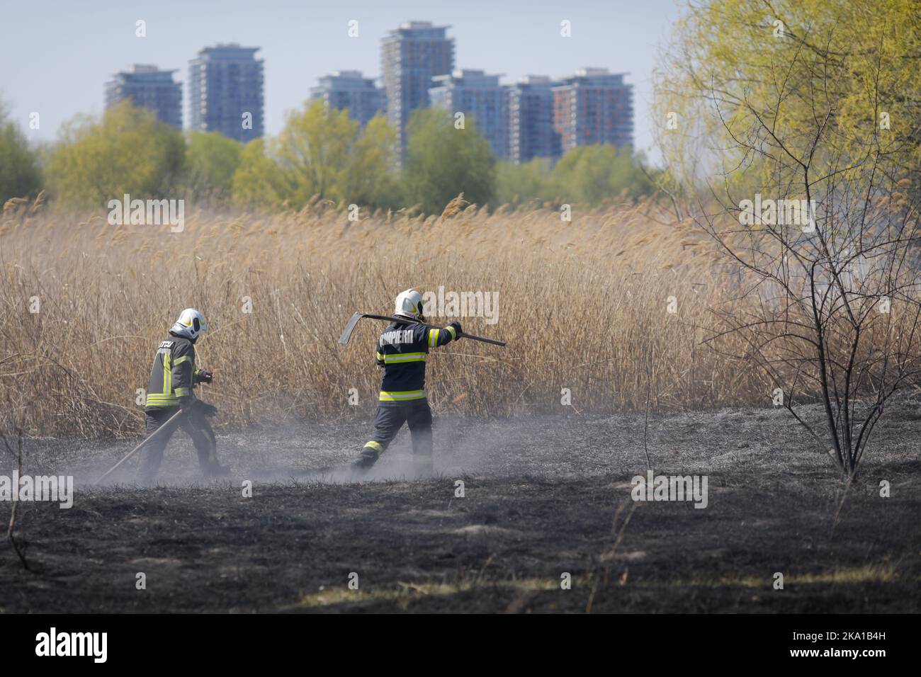 Bucharest, Romania - April 5, 2022: Firefighters try to extinguish a ...