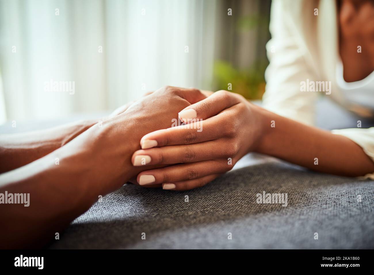 You have a friend in me. Closeup of two unrecognizable peoples hands ...