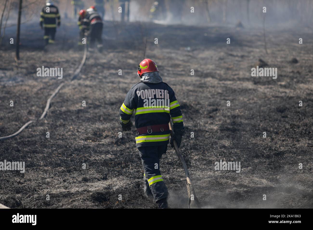 Bucharest, Romania - April 5, 2022: Firefighters try to extinguish a ...