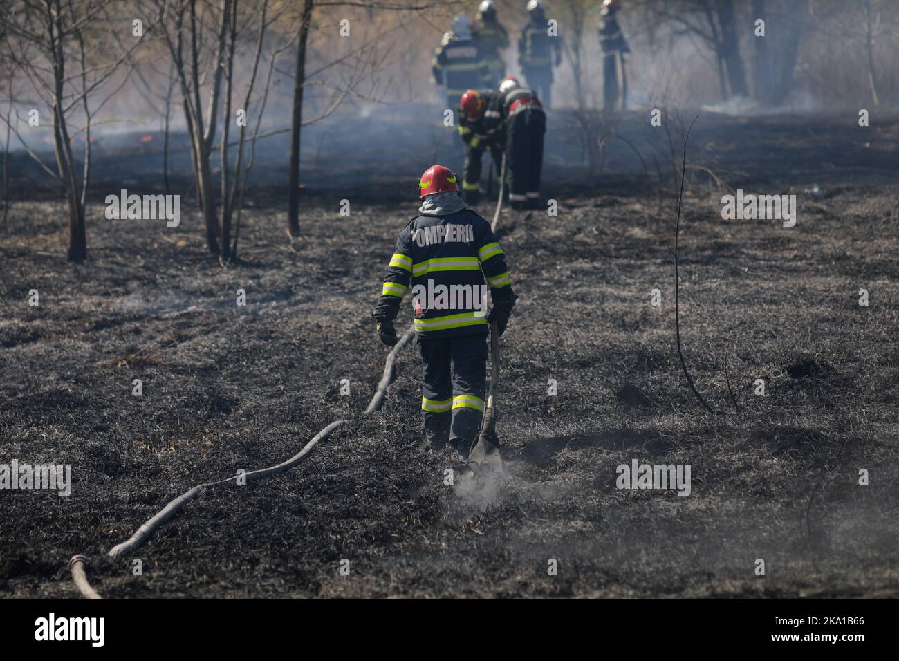 Bucharest, Romania - April 5, 2022: Firefighters try to extinguish a ...
