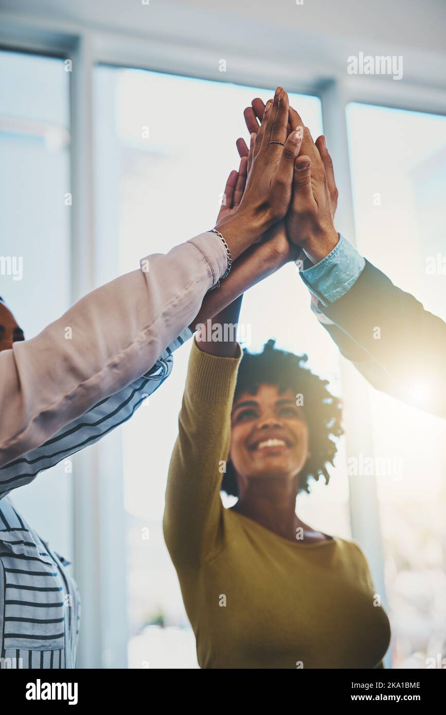 High fiving people hi-res stock photography and images - Alamy