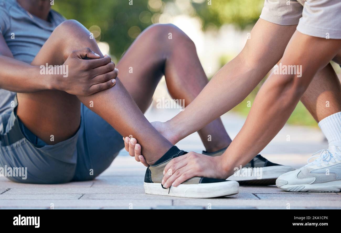 Hand on ankle hi-res stock photography and images - Alamy