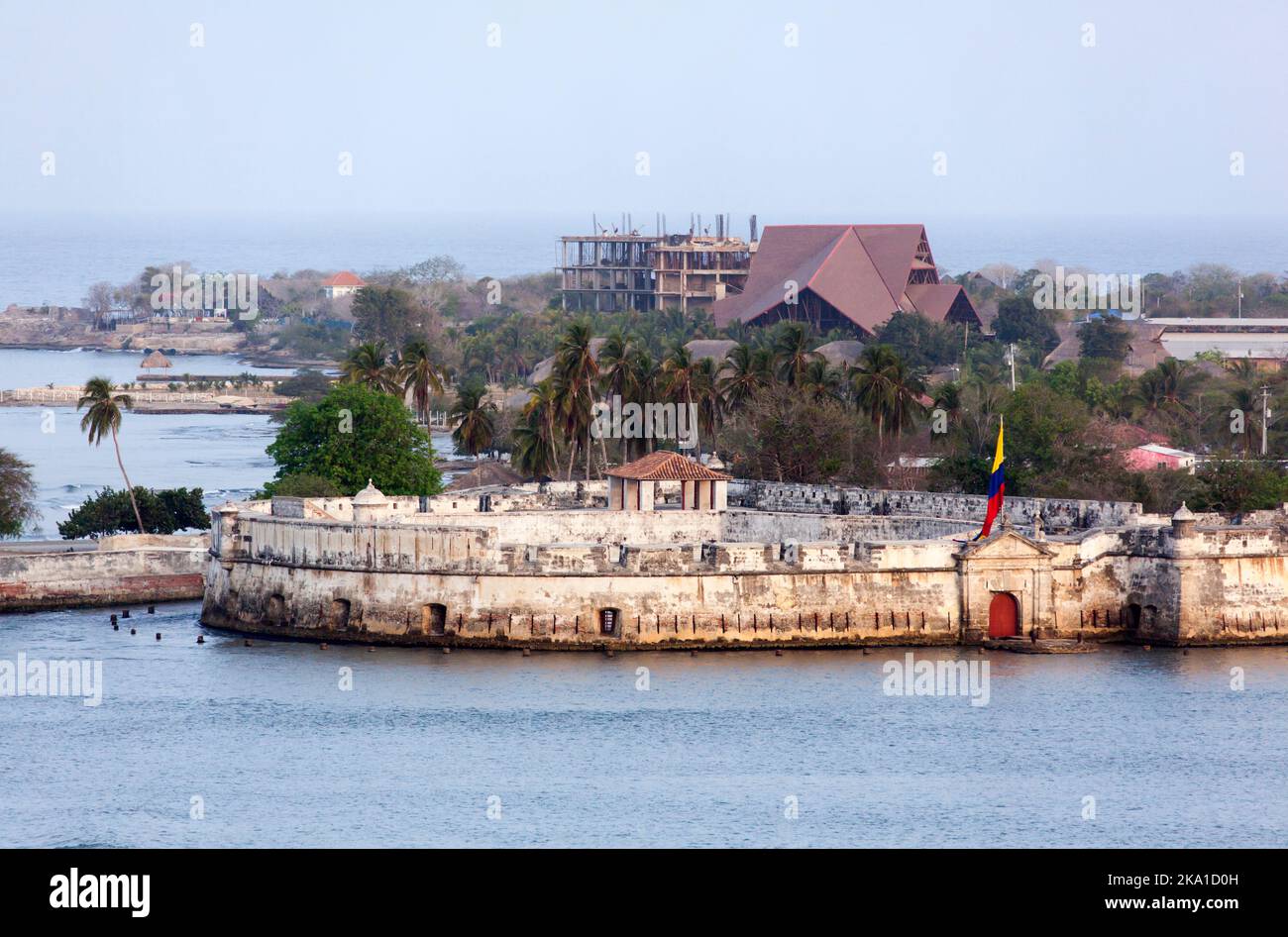 The early morning view of historic fort with a flag in Cartagena city ...