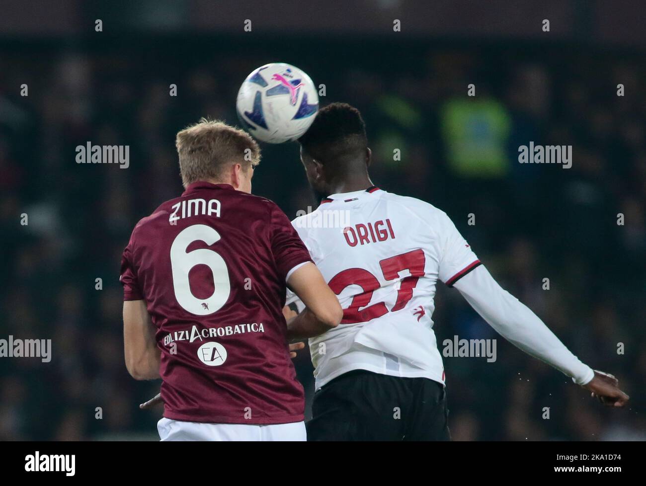 David Zima of Torino Fc and Divocj Origi of Ac Milan during the Italian ...