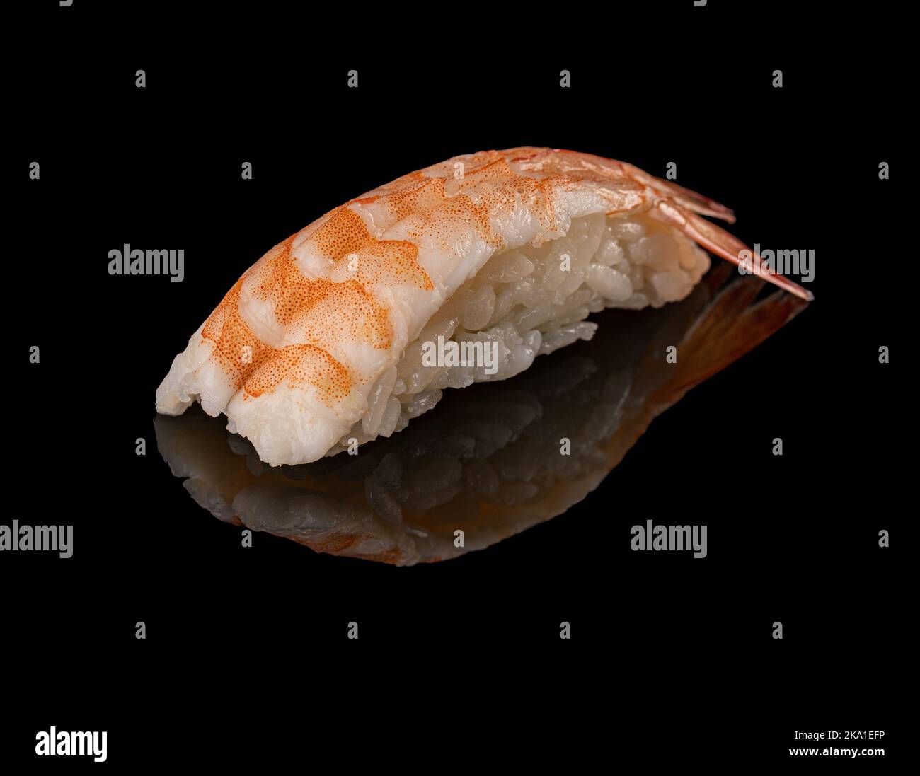Delicious prawn nigiri sushi on black background Stock Photo - Alamy