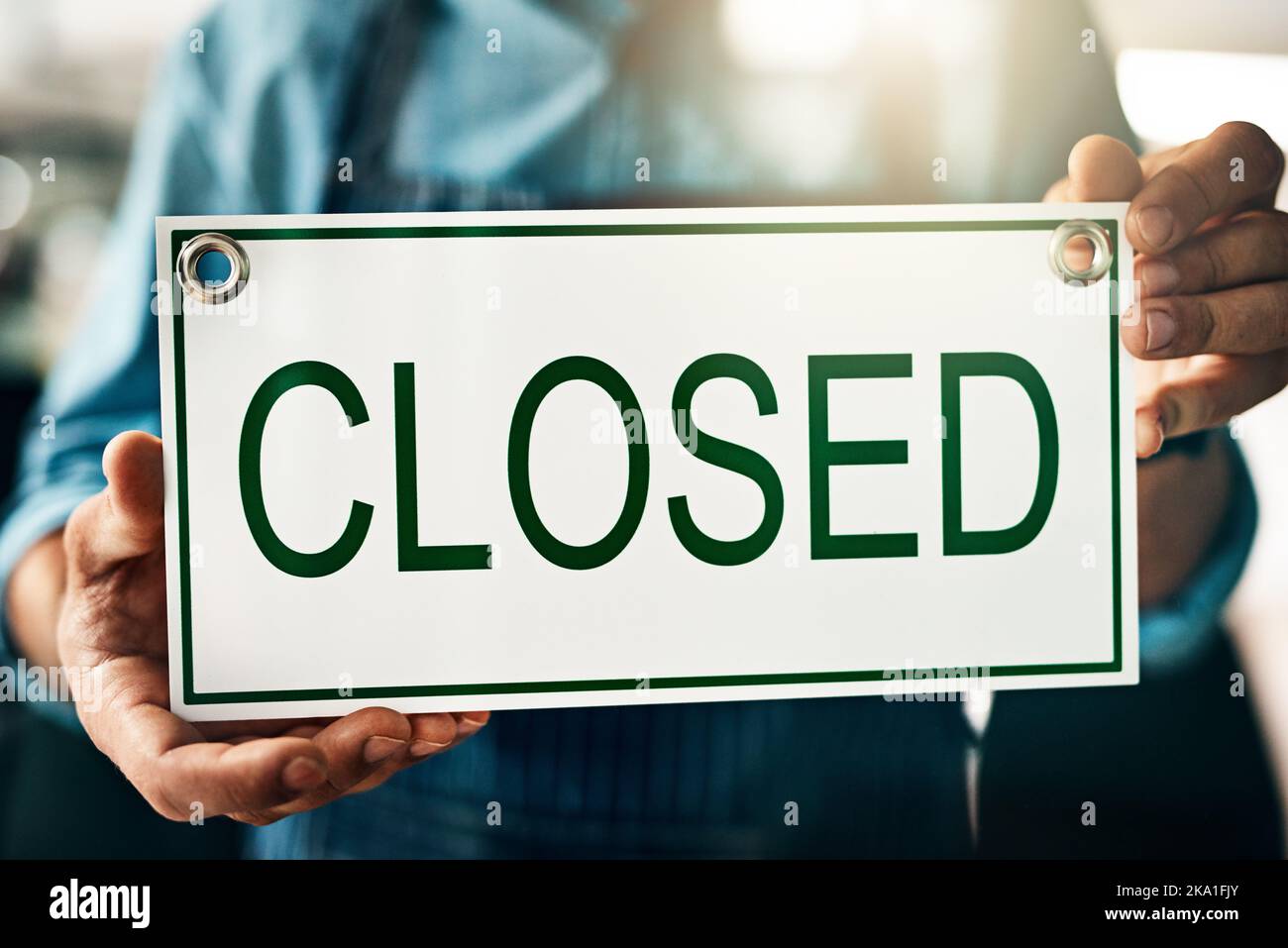 Man standing holding sign hi-res stock photography and images - Alamy