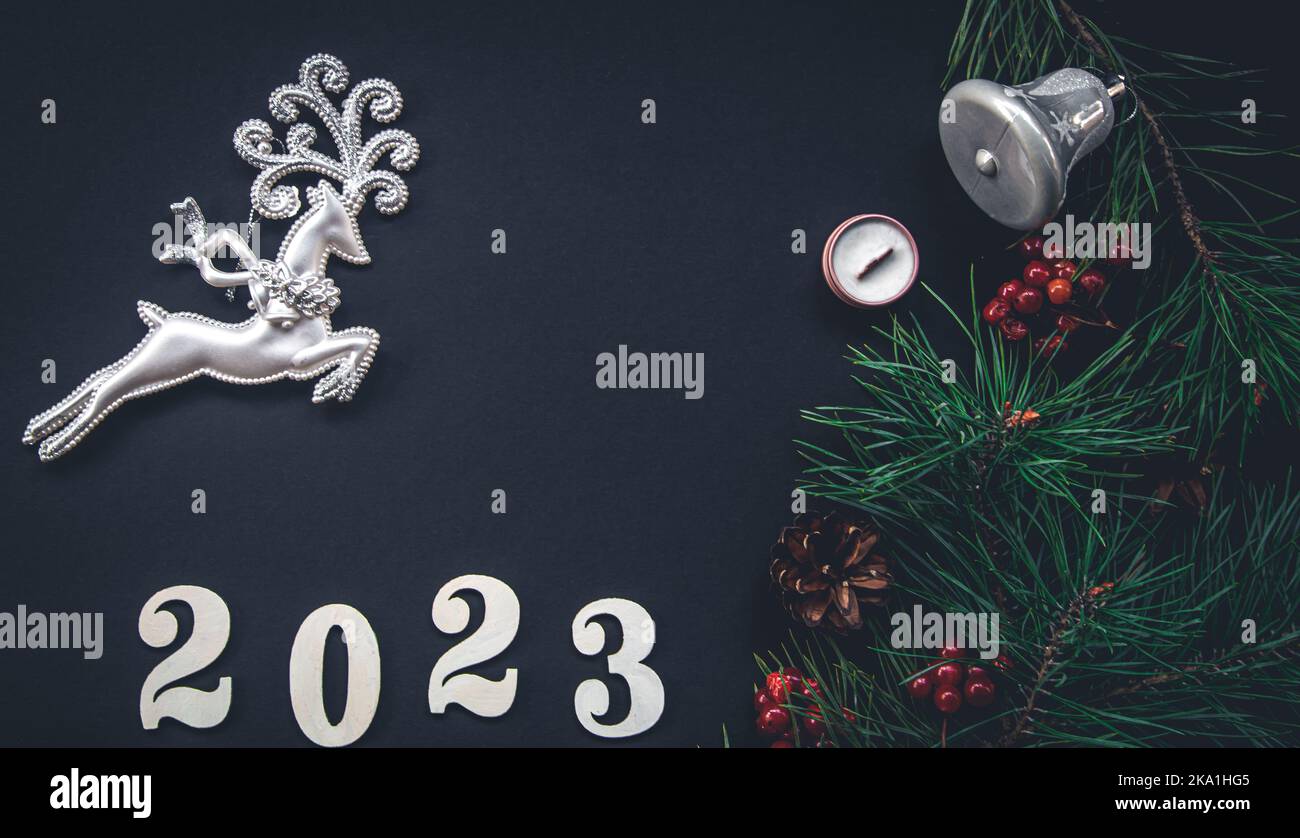 Christmas background with numbers 2023 and decor details, flat lay ...