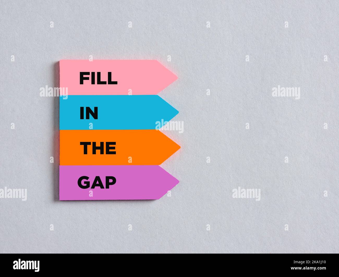 Colorful arrow shaped stickers with the message fill in the gap ...