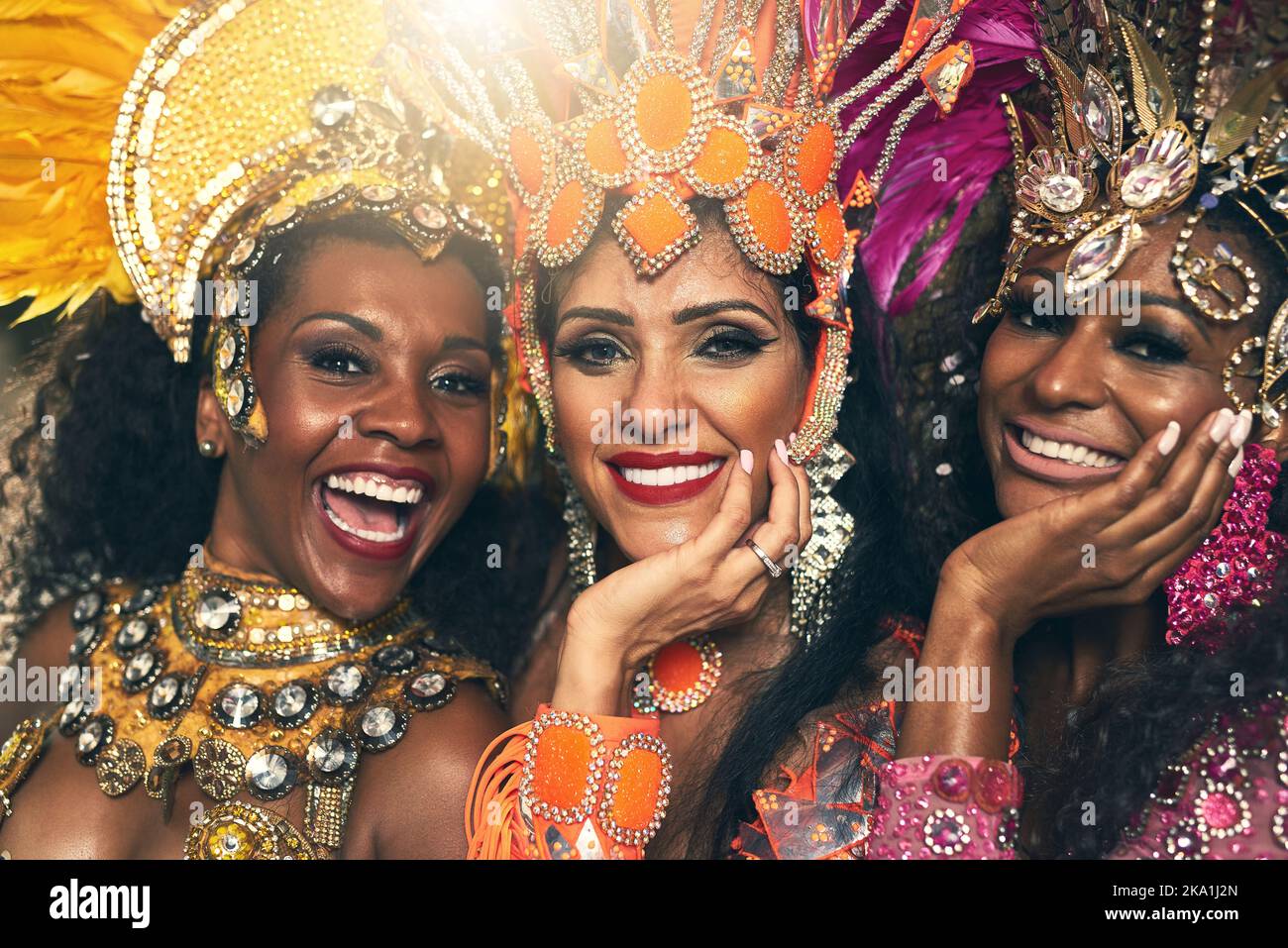 Sultry samba queens. Cropped portrait of three beautiful samba dancers ...