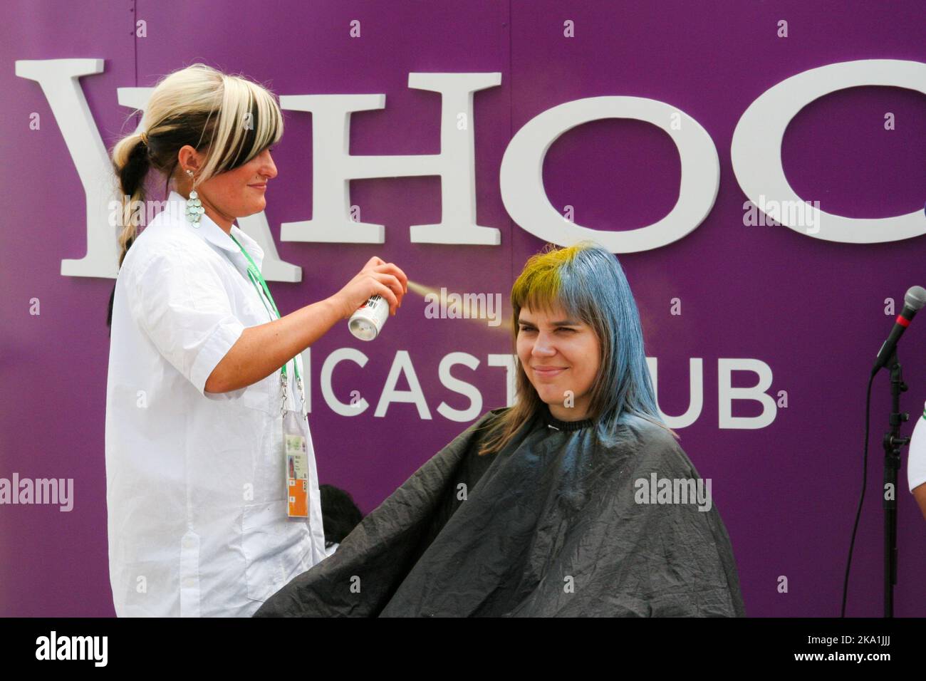 A Ukraine Football Supporter Having Her Hair Sprayed In The Ukraine