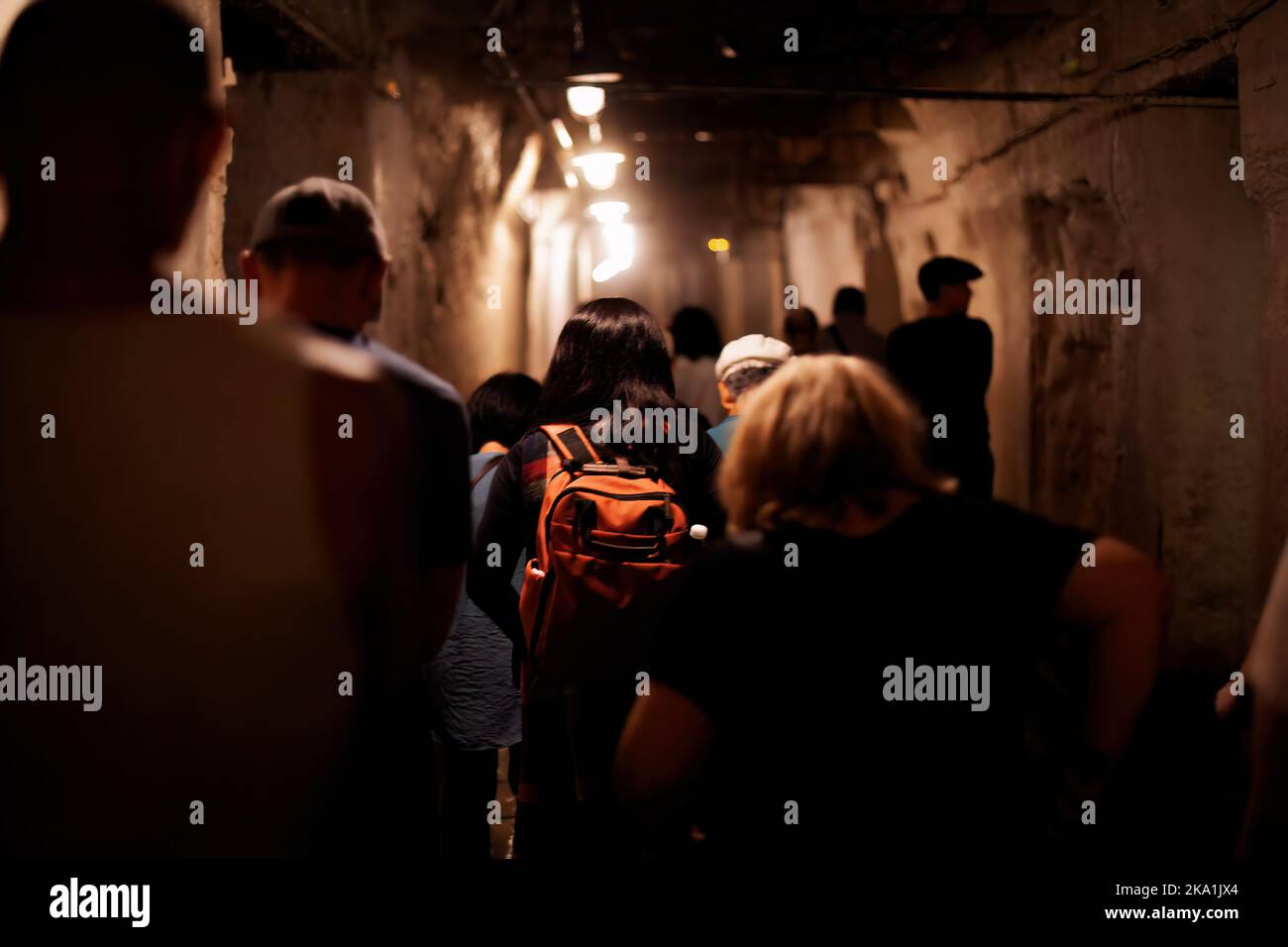 People in an underground tunnel. People go into an underground tunnel ...