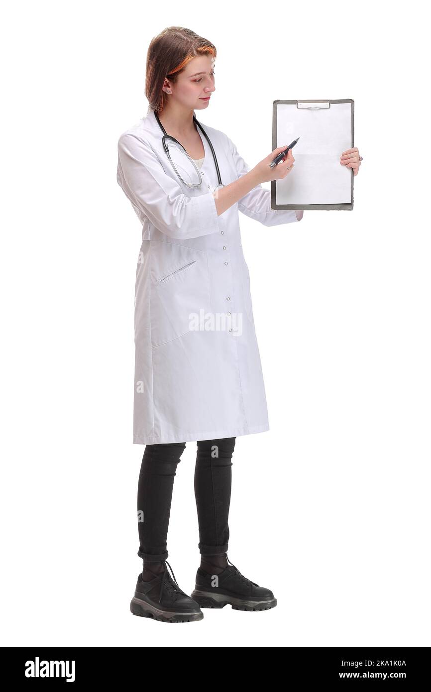 Attractive Female Doctor In A Lab Coat Displaying A Blank Clipboard In