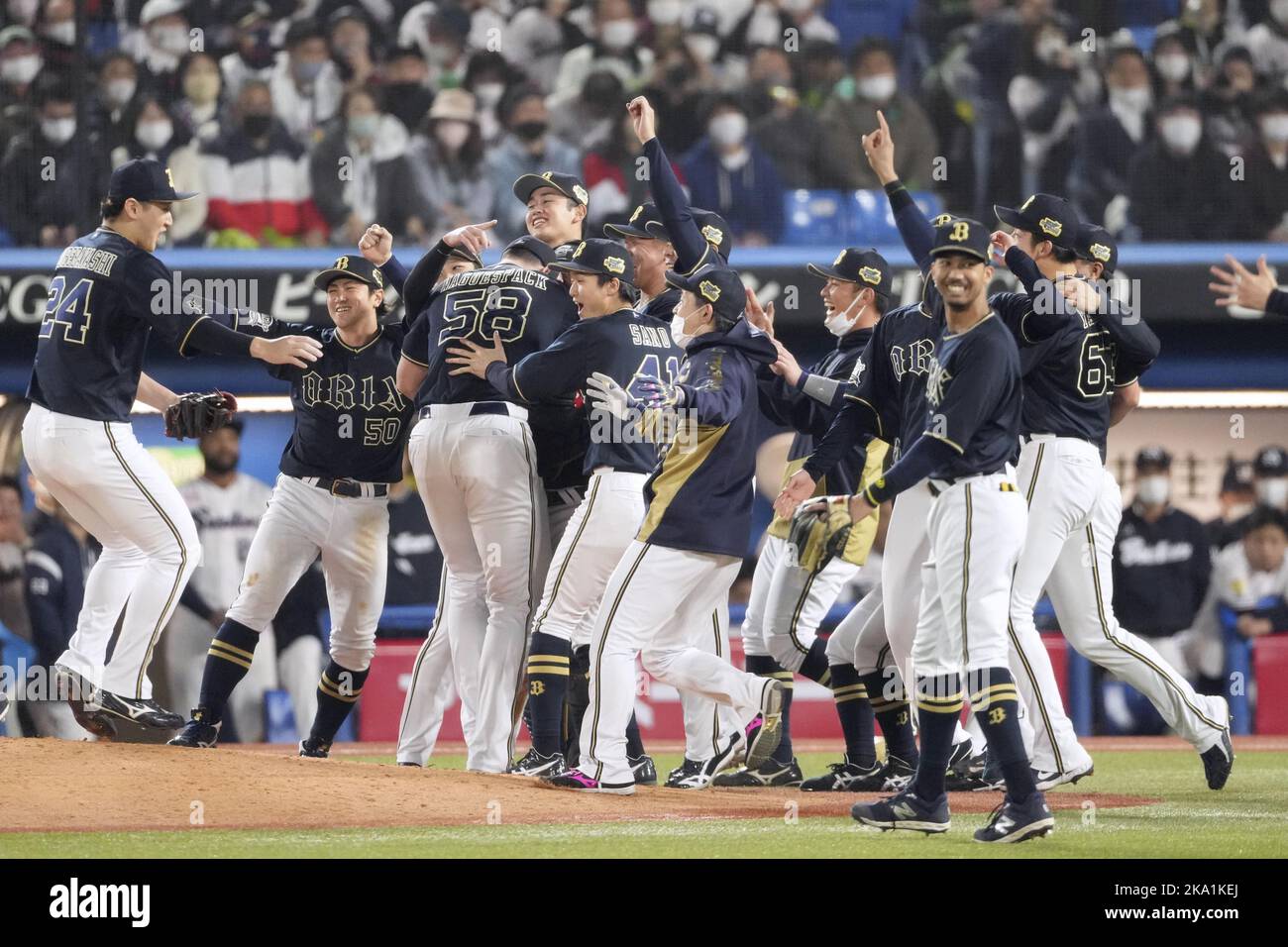 Orix Buffaloes players celebrate after the team claimed the Japan Series baseball title in Game ...