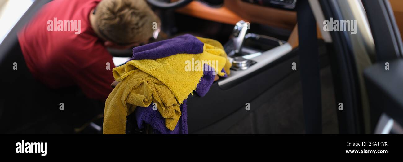 Master does complete dry cleaning of interior of car Stock Photo - Alamy