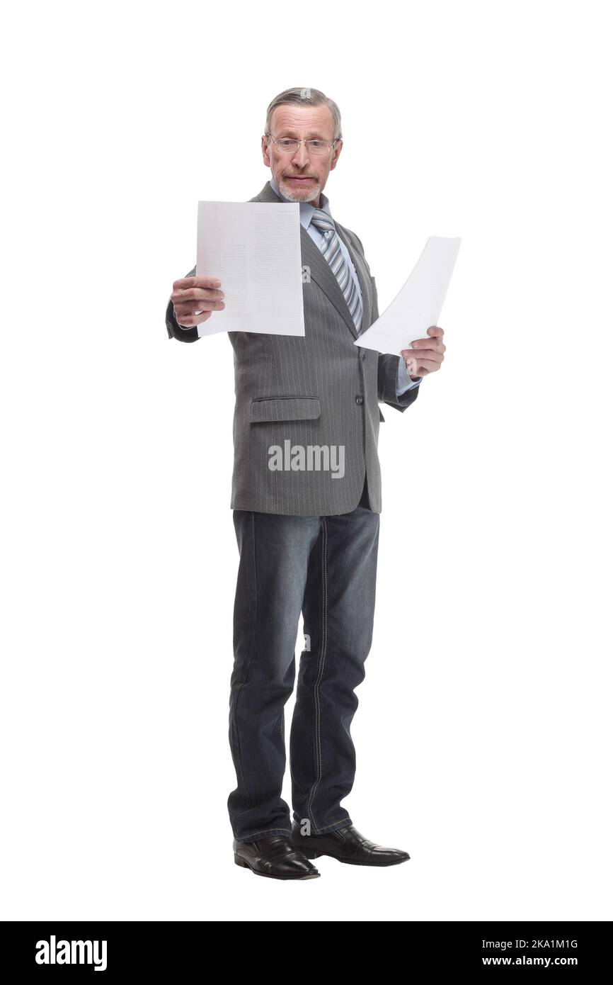 Shot of a senior professional man holding papers in his hand and doing ...