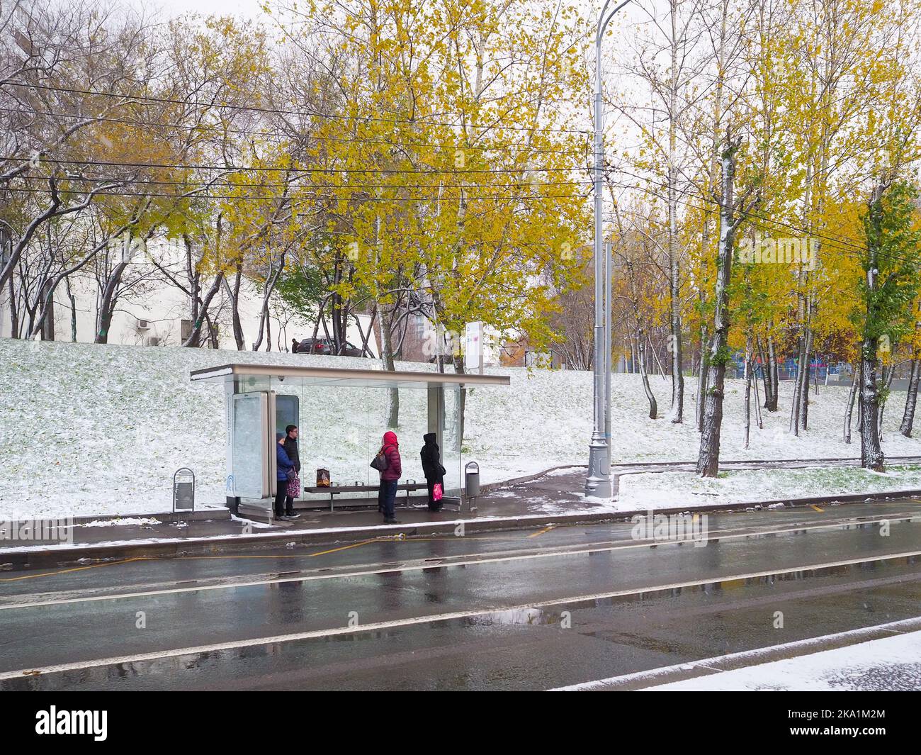 Moscow. Russia. October 31, 2022. People at a public transport stop are ...
