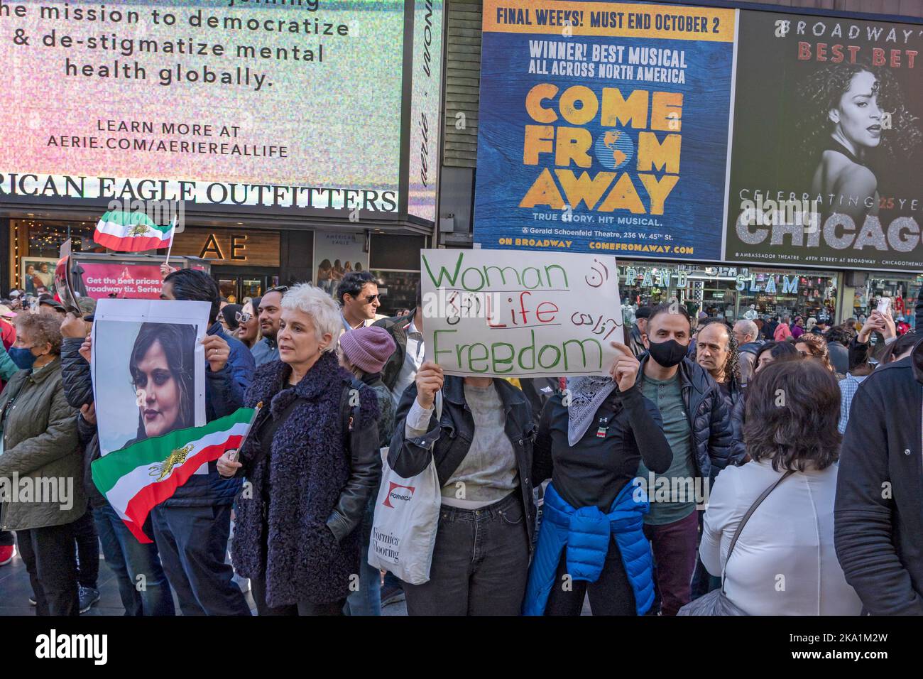 New York, United States. 29th Oct, 2022. A protester holds a "WOMAN ...