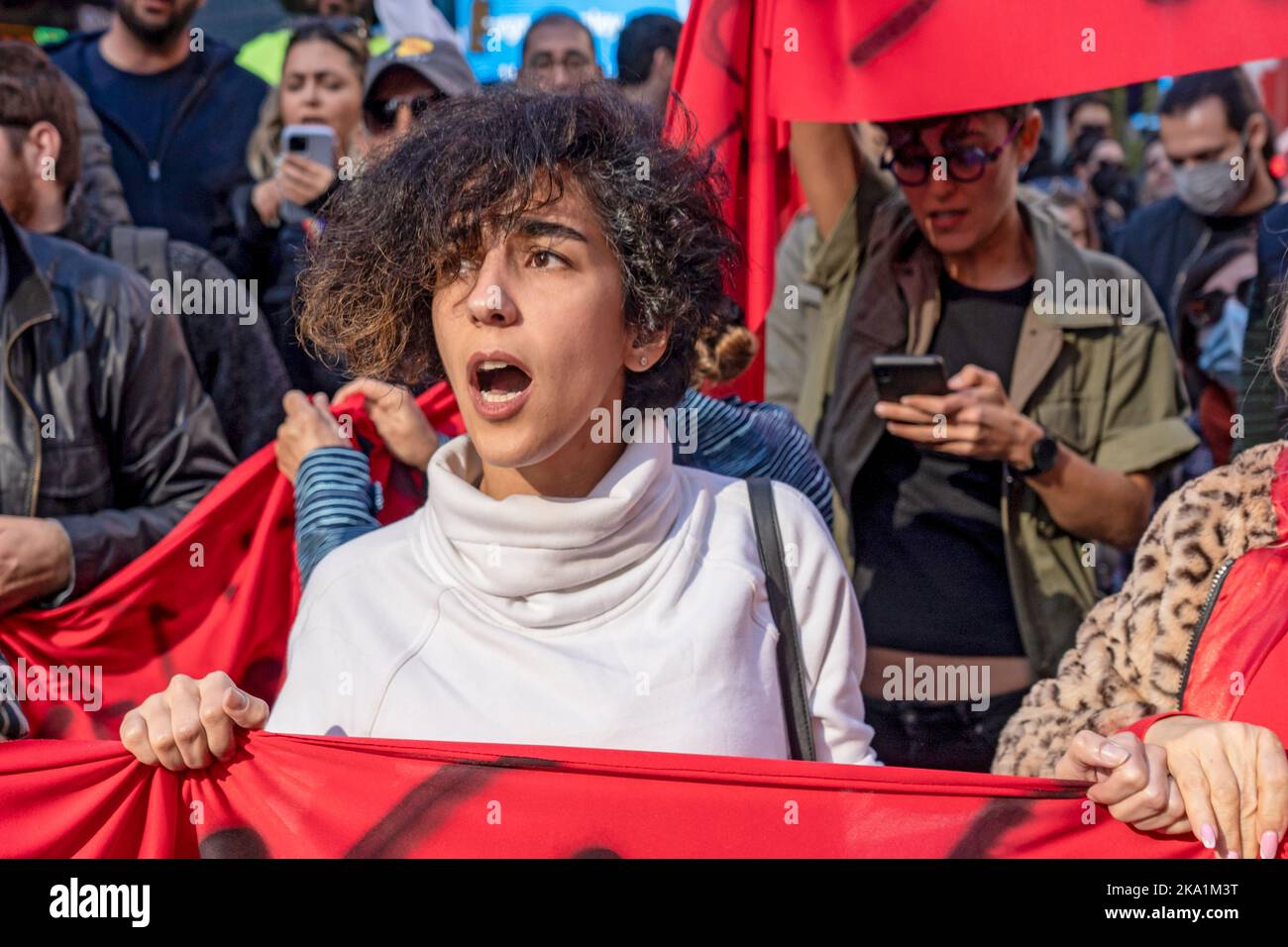 New York, United States. 29th Oct, 2022. Emotional protesters sing ...