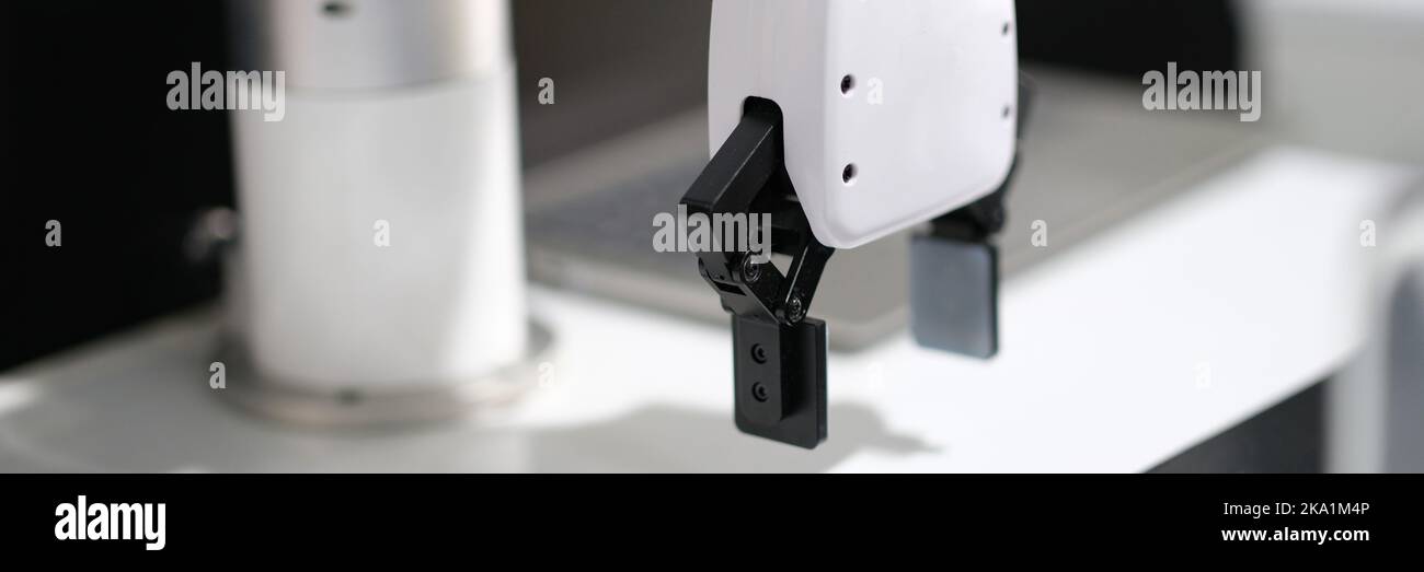 Mechanical arm of robotic arm in production closeup Stock Photo - Alamy