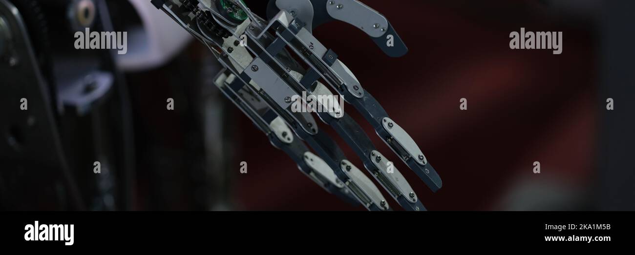 Dark metal robot arm. Technology and science concept Stock Photo - Alamy