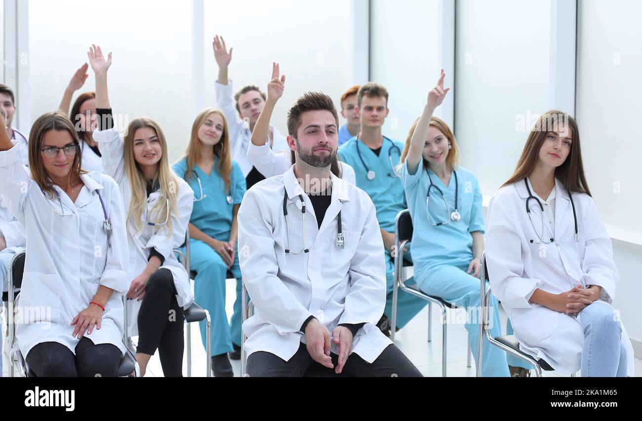 top view. a group of smiling doctors pointing at you Stock Photo - Alamy