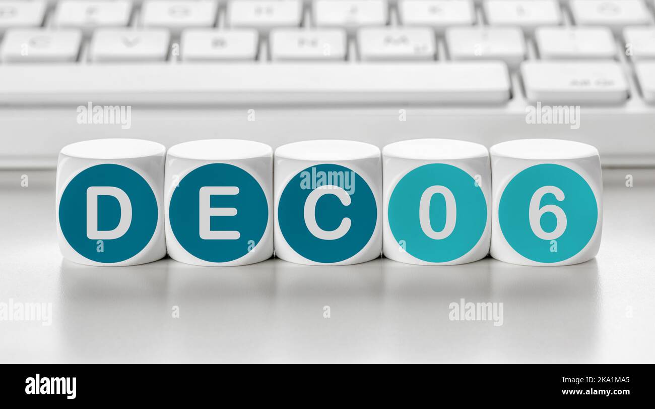 Letter dice in front of a keyboard - December 06 Stock Photo - Alamy
