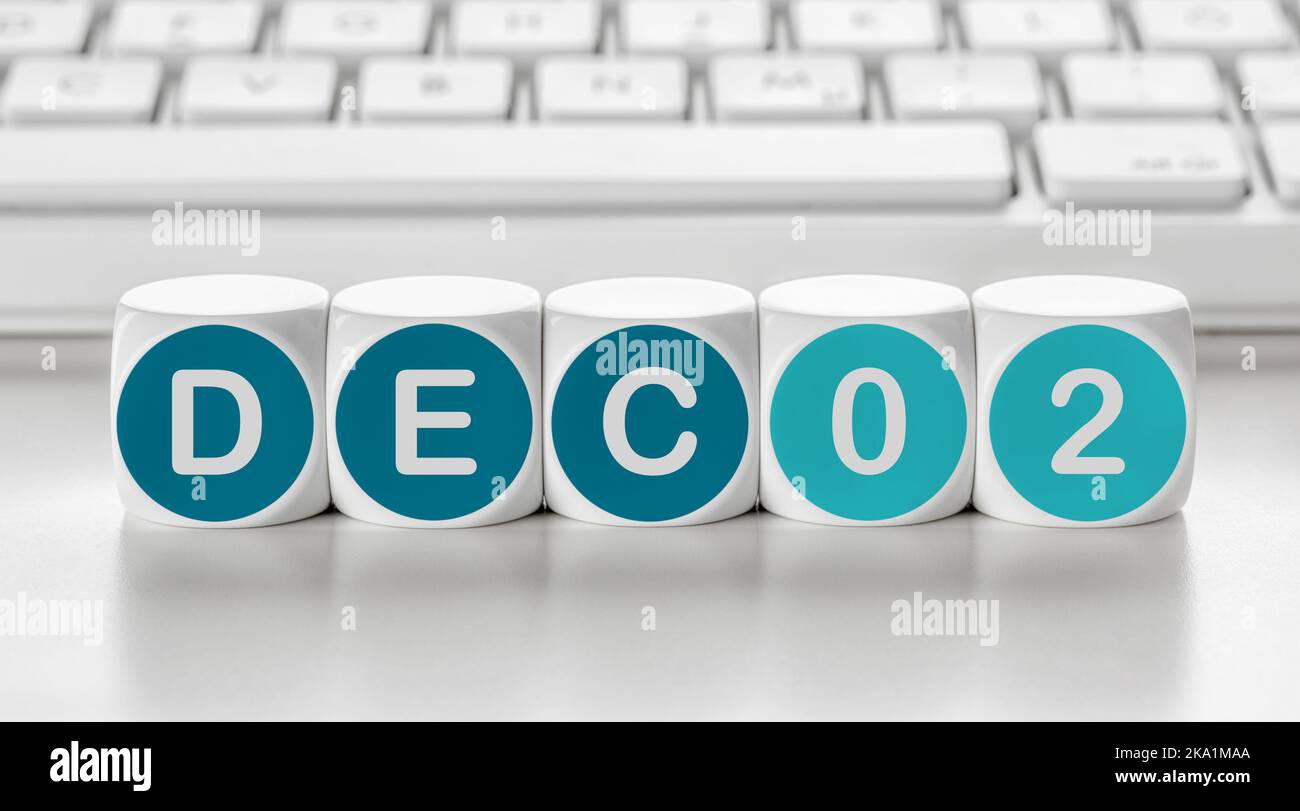 Letter dice in front of a keyboard - December 02 Stock Photo - Alamy