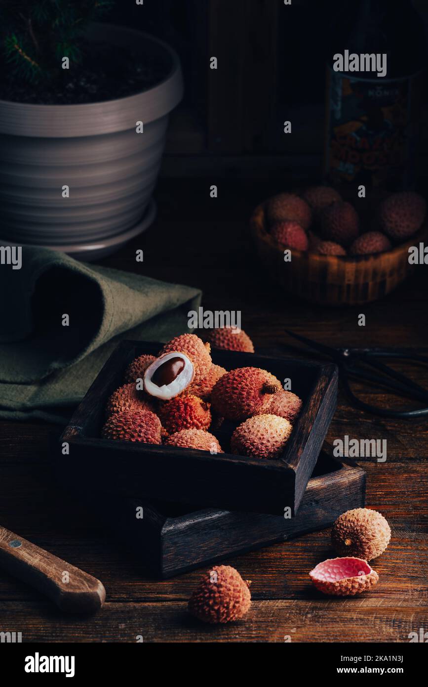 Delicious Lychee Fruits in Rustic Wooden Box Stock Photo - Alamy