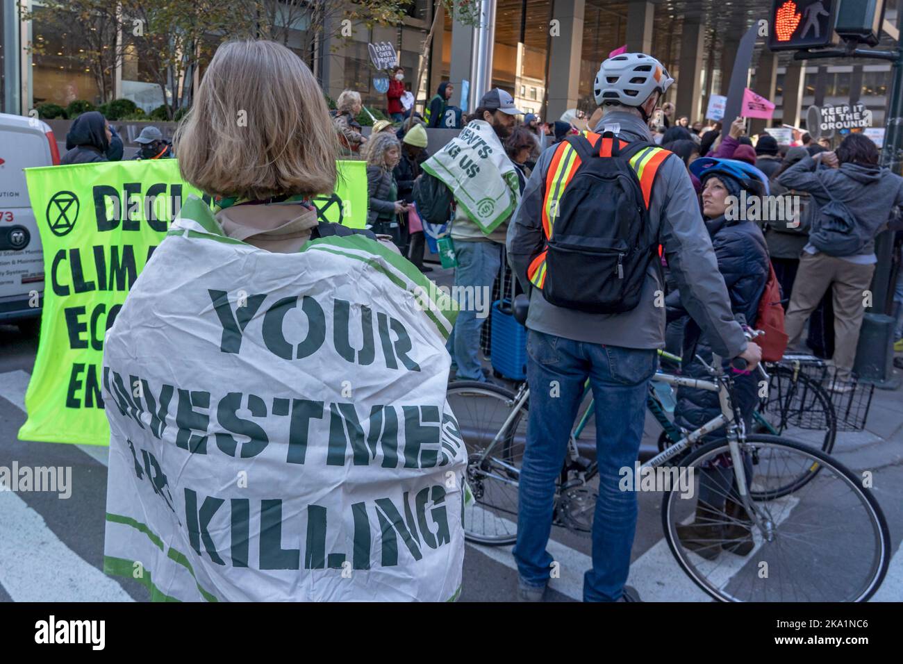Climate activists hold signs hi-res stock photography and images - Alamy