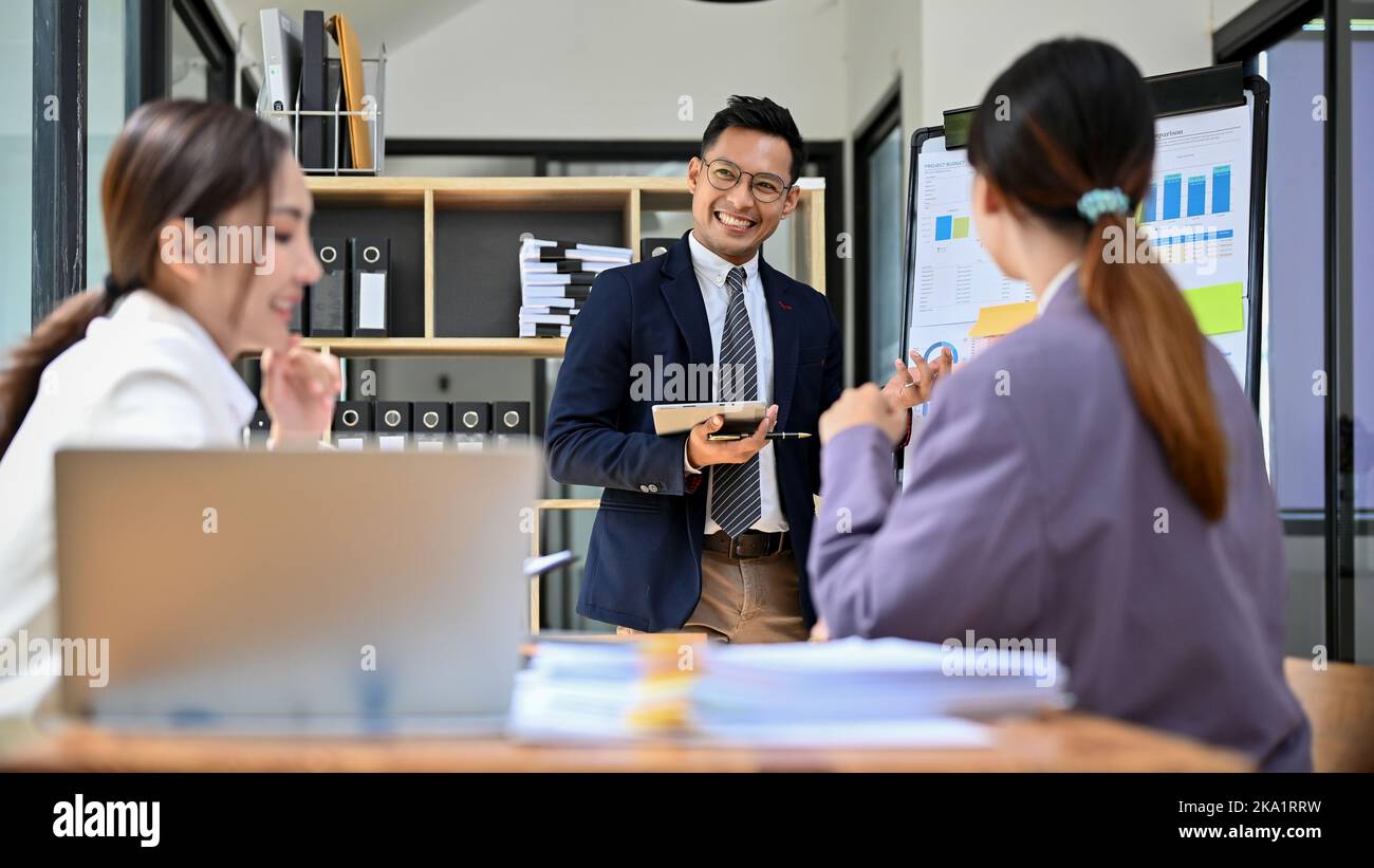 Asian businessman presenting in meeting hi-res stock photography and ...