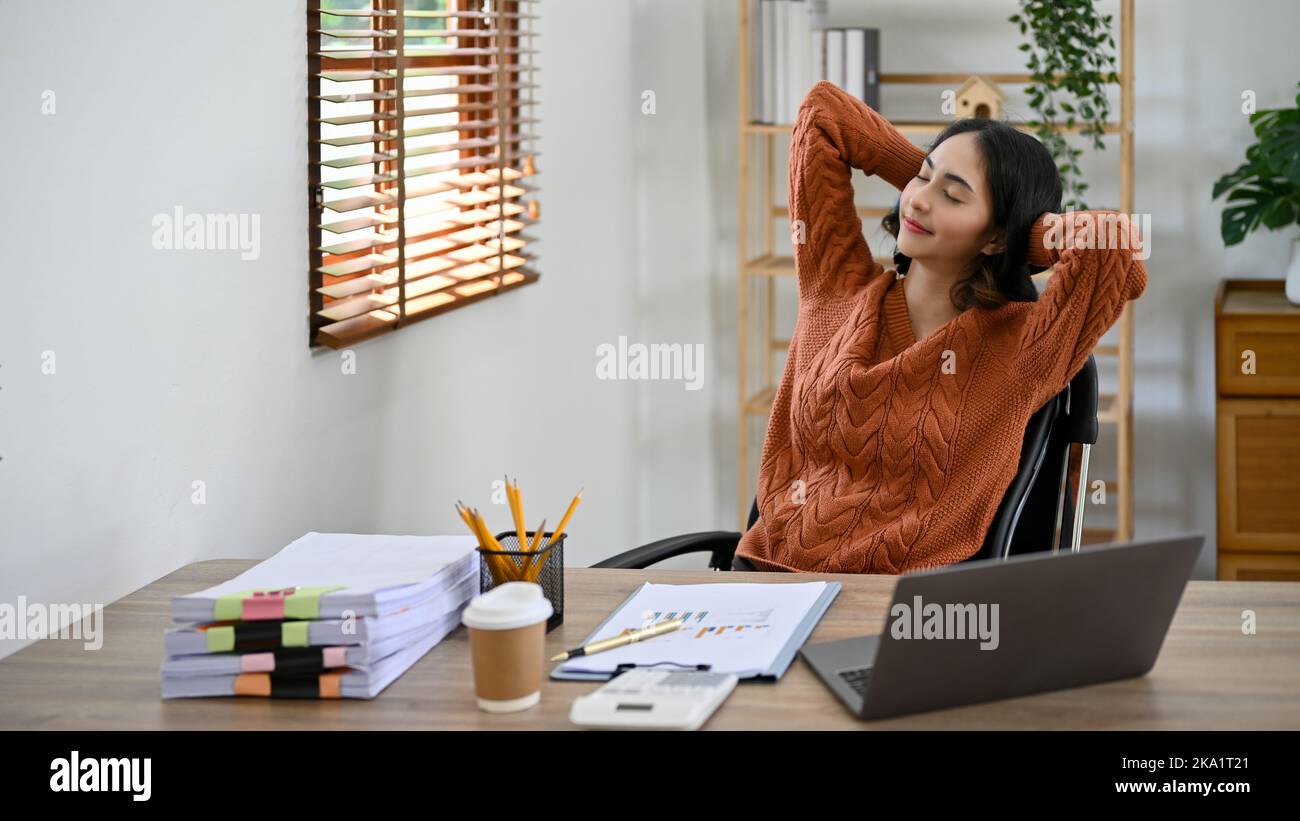 Relaxed and calm millennial Asian businesswoman or female manager ...