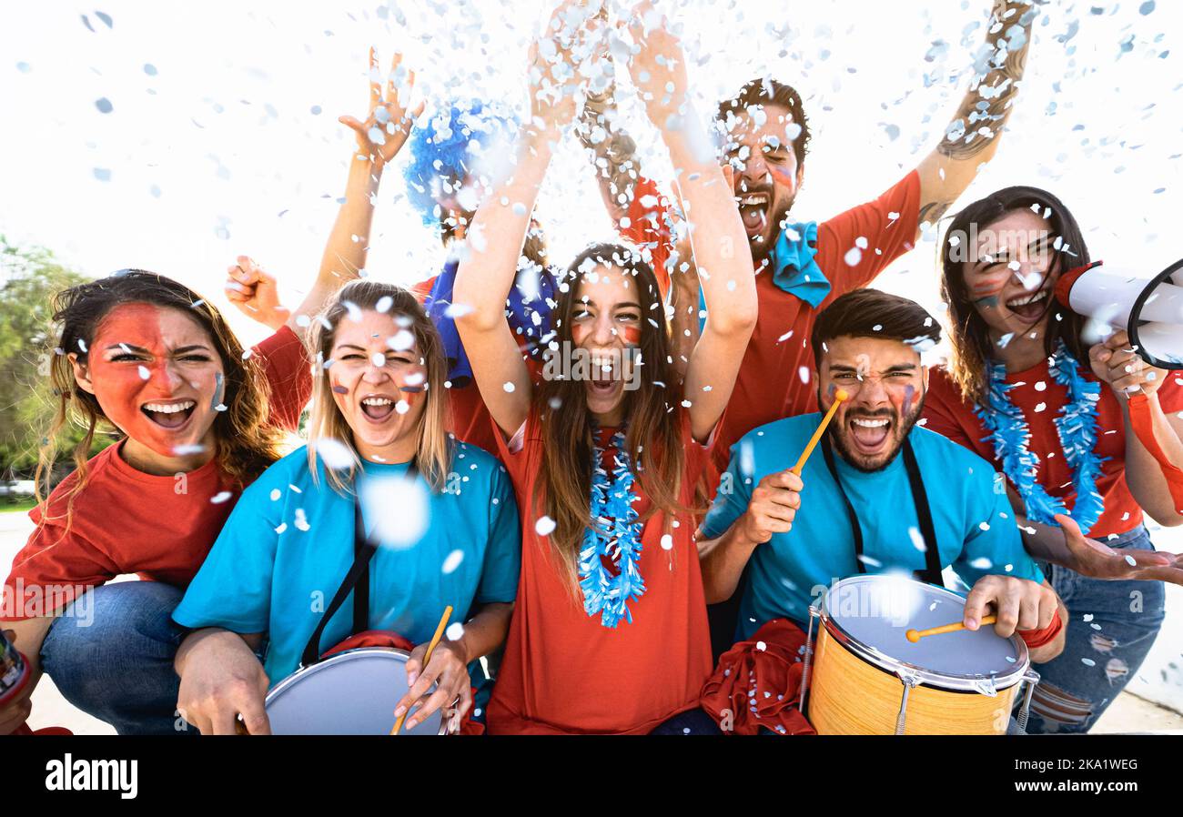 Football fans having fun supporting their favorite team - Soccer sport ...