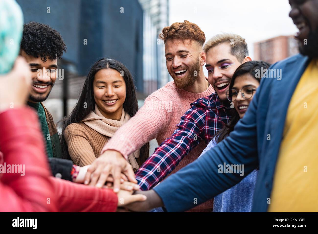 Stacking their hands african hi-res stock photography and images - Alamy
