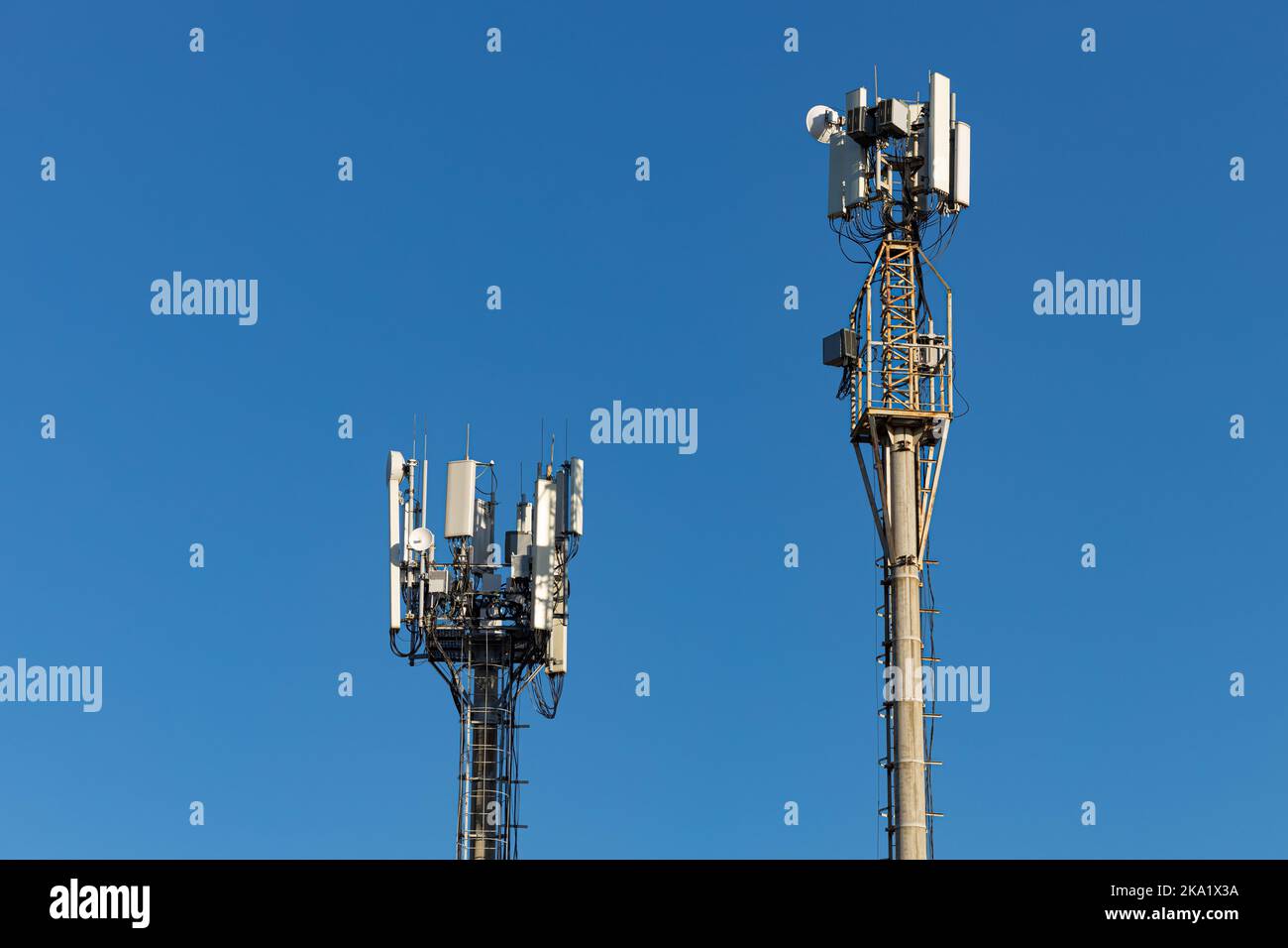 cell tower with antenna against blue sky. cell tower Stock Photo - Alamy
