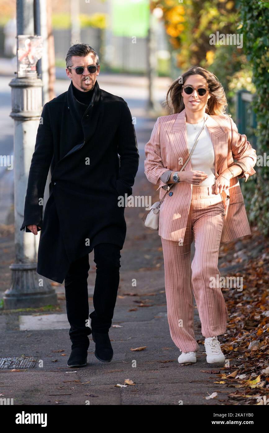 Joey Barton (left) arrives at Wimbledon Magistrates' Court where he is ...