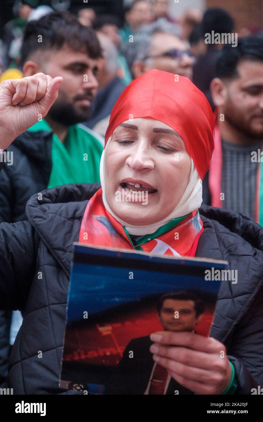 Supporters of Pakistan Tehreek-e-Insaf arrive at Avenfield House where ...