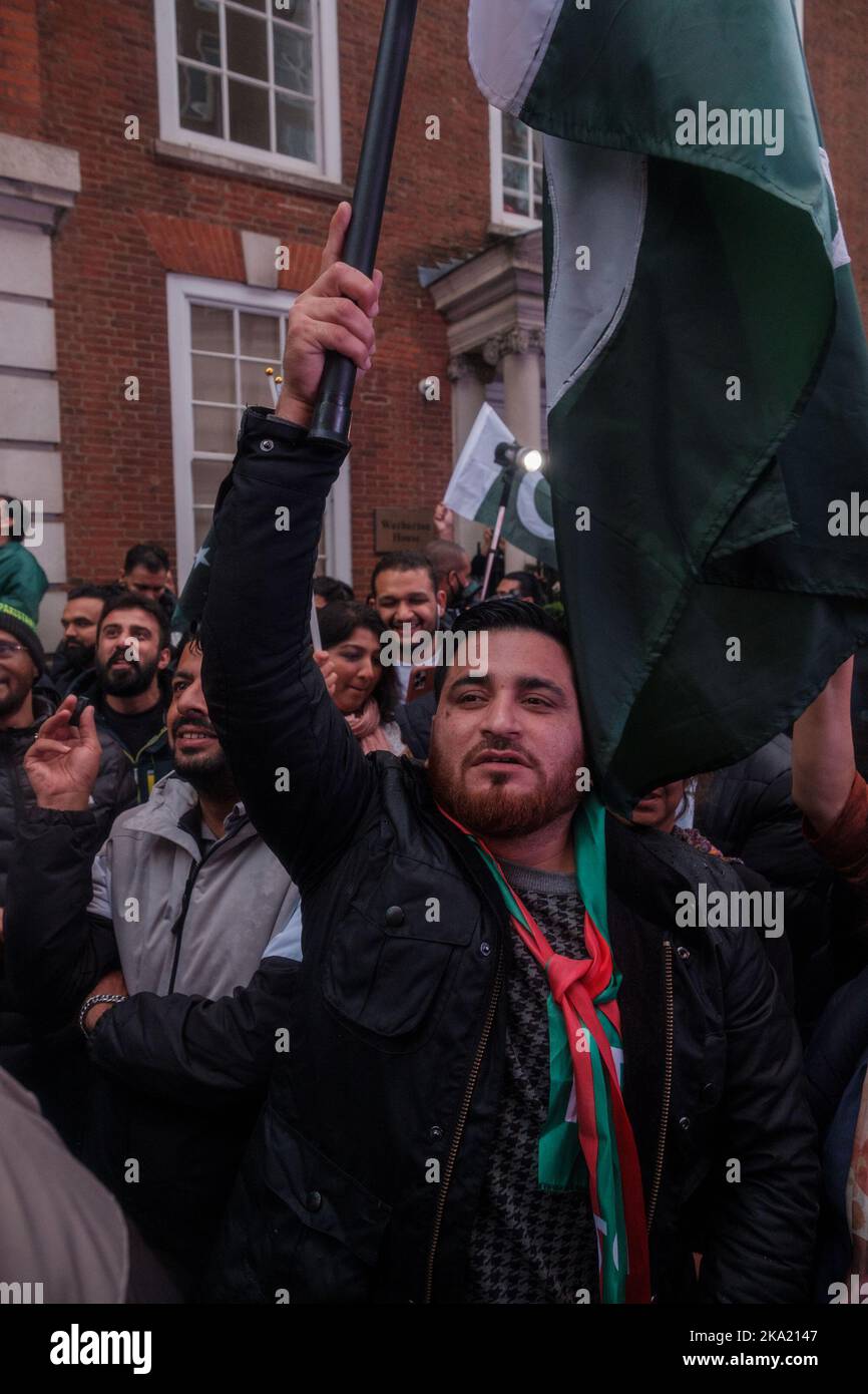 Supporters of Pakistan Tehreek-e-Insaf arrive at Avenfield House where ...