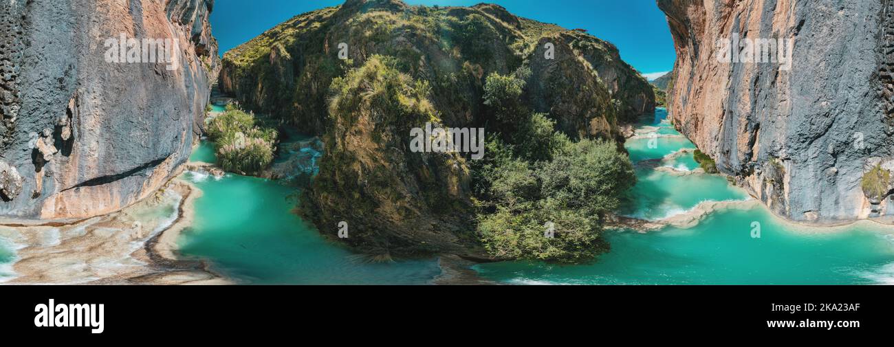 Panoramic view of the turquoise natural pools of Millpu in Huancaraylla ...