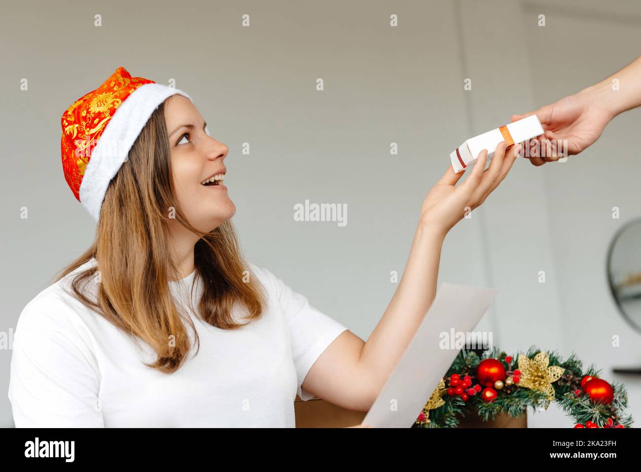 People celebrate Christmas in love and happiness - beautiful girl gets ...